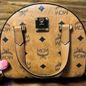 MCM | Bags | Rare Mcm Signature Cognac Diamond Logo Leather Mini Round ...